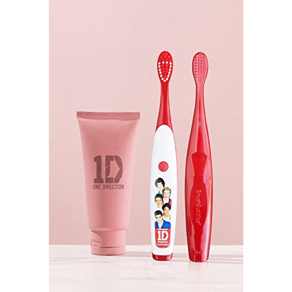 B. Designs One Direction Singing Battery Powered Tooth Brush (Live While we’re Young)/Limited Edition