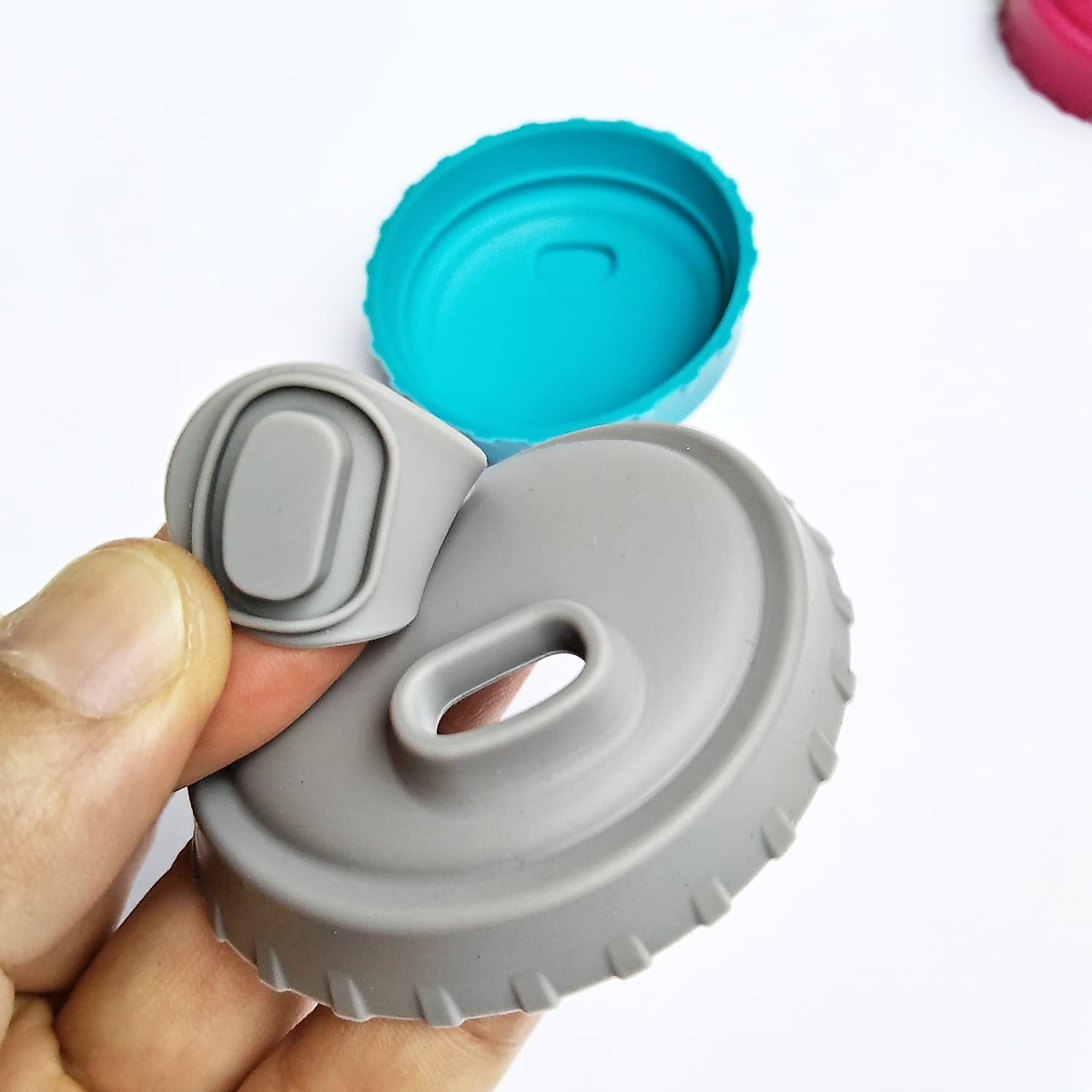 2 Pack Reusable Silicone Can Protector Lid or Covers with Resealable Nozzle for Standard Soda/Beverage/Beer Cans - Prevents Spills - Retains Fizz - BPA-Free (Orange & Blue)