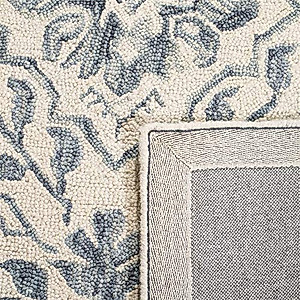 SAFAVIEH Dip Dye Collection Area Rug - 8' x 10', Blue & Ivory, Handmade Wool, Ideal for High Traffic Areas in Living Room, Bedroom (DDY901M)