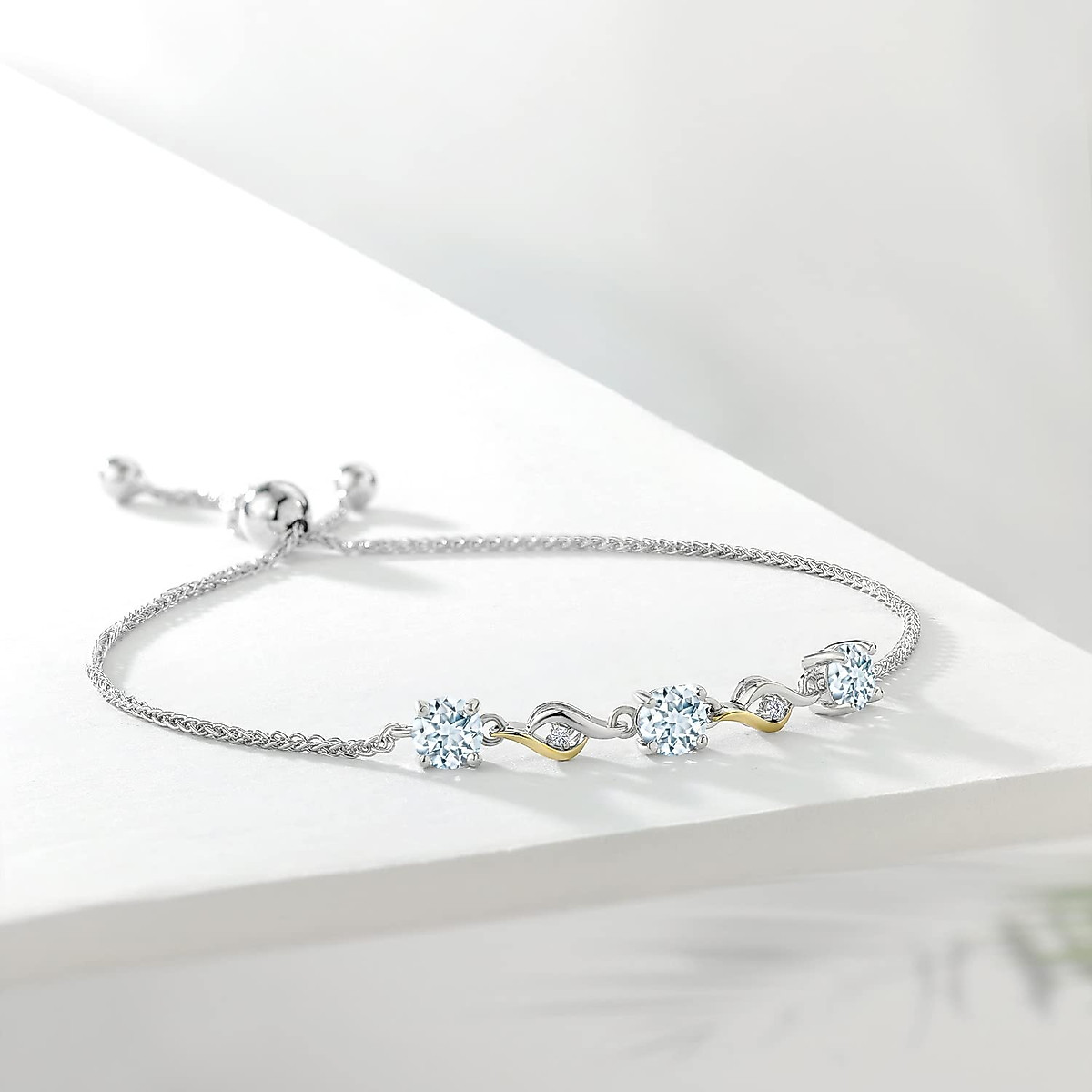 Gem Stone King 925 Silver and 10K Yellow Gold Bracelet For Women Round Sky Blue Aquamarine and Moissanite (1.52 Cttw)