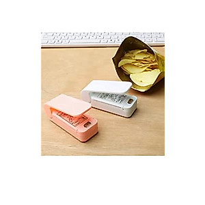 Portable Bag sealing machine mini magical sealer - latest upgraded snack sealer seals the bag to keep it fresh, small in size magnet attached to mount only takes 2 AA batteries and gently operate without any button. Perfect for bags of snacks