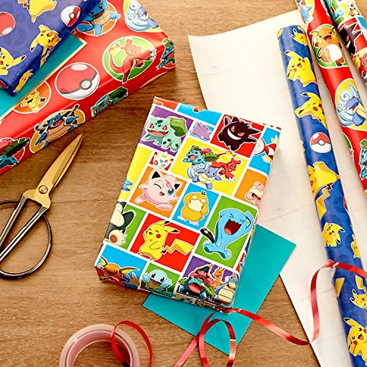 Hallmark Pokémon Wrapping Paper with Cutlines on Reverse (3 Rolls: 60 Sq. Ft. Ttl) with Pikachu, Charmander, Bulbasaur for Birthdays, Kids Parties, Gamers, Christmas Gifts