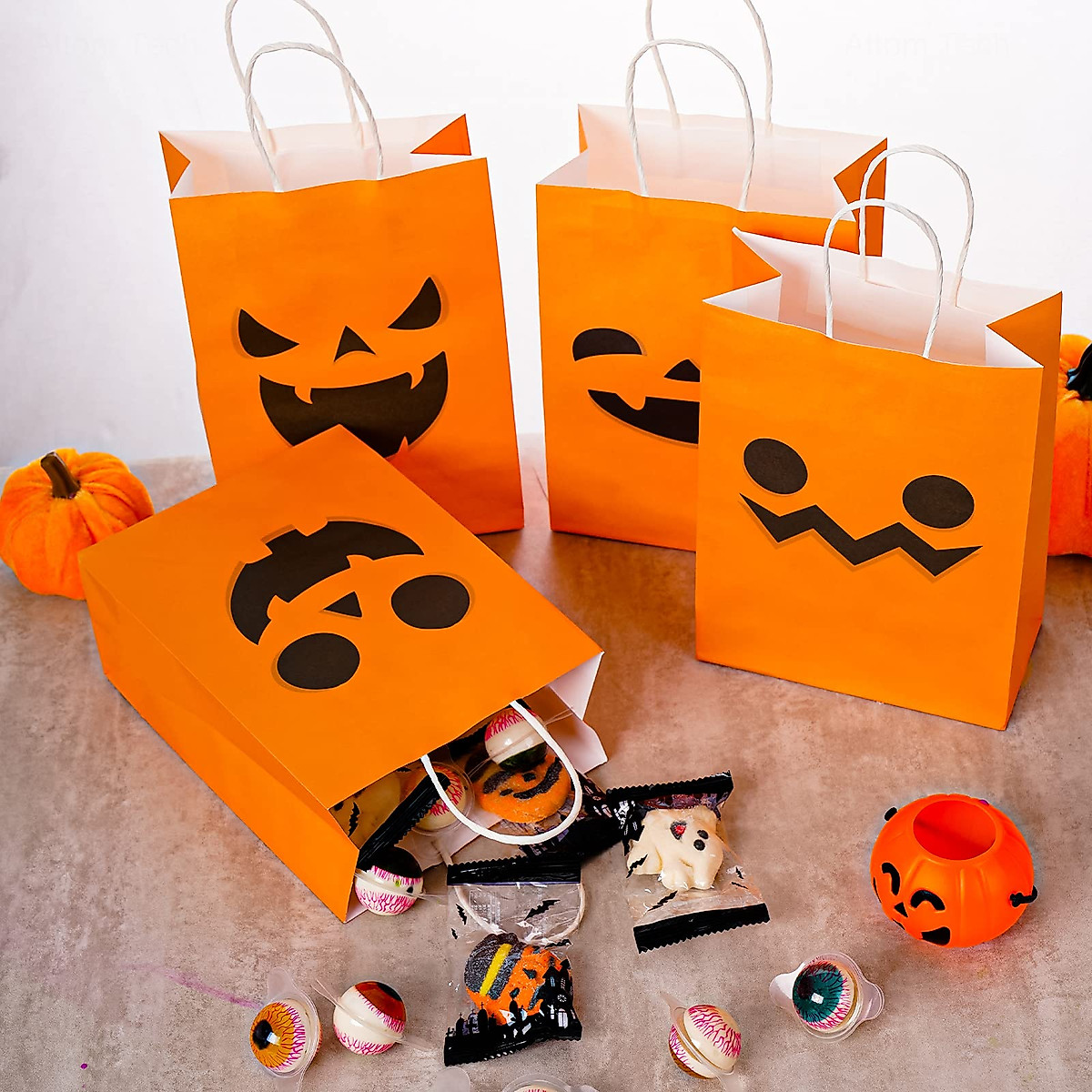 NiHome 16-Pack Halloween Pumpkin Kraft Paper Treat Bags with Handles - Assorted Jack-o'-lantern Designs for Trick or Treat, Party Favors, Candy, Cookies, and Gifts