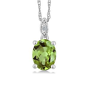 Gem Stone King 10K White Gold Green Peridot and Diamond Pendant Necklace For Women (1.80 Cttw, Gemstone Birthstone, Oval 9X7MM With 18 Inch Chain)