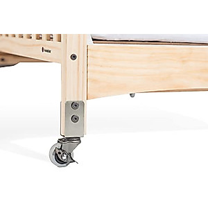 Foundations Serenity SafeReach Crib with Adjustable Mattress Board, Compact Baby Crib with Commercial Grade Casters, Clear End Panels for Child Visibility, Includes 3” Foam Mattress (Natural)