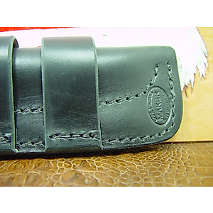 Custom Made Cross Draw Knife Sheath That Will fit The SOG Seal pup Dyed Black. A lot of Leather for The Price. Can be Worn on Left or The Right Hand Side.