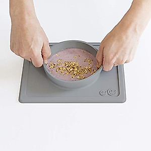 ezpz Mini Bowl - 100% Silicone Suction Bowl with Built-in Placemat for Infants + Toddlers - Comes with a Reusable Travel Bag (Gray)