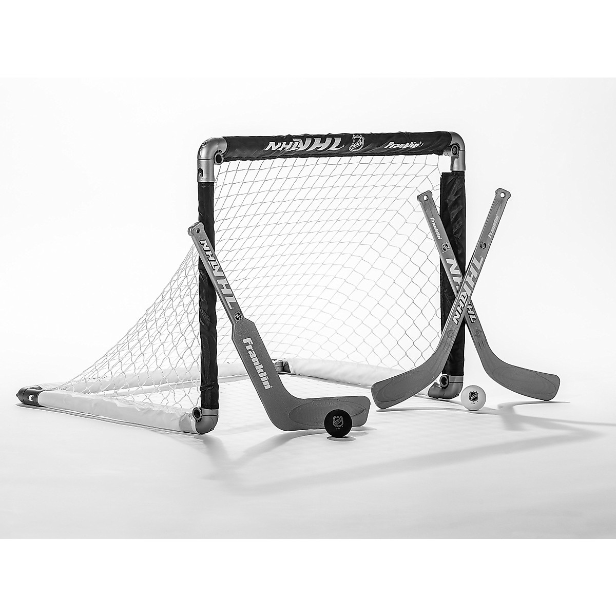 Franklin Sports NHL Mini Hockey Goal Set of 2 - Black - Includes Mini Hockey Goals, 4 Hockey Sticks, 2 Goalie Sticks, and 4 Foam Hockey Balls