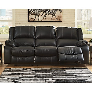 Signature Design by Ashley Calderwell Faux Leather Manual Pull-Tab Reclining Sofa, Black