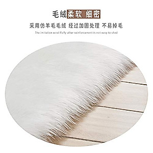 Briskaari Soft Fluffy Faux Sheepskin Fur Area Rugs,Rectangle Faux Fur Carpet for Living Room Bedroom Dining Room Nursery Foyer or Home Office Home Decor Floor Carpet (2.3ftx6ft, Pink)