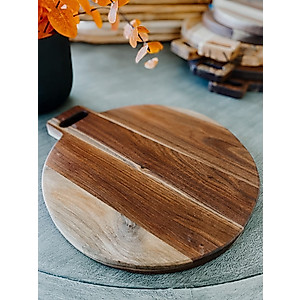 Round charcuterie serving board with handle, handmade in the USA with Walnut hardwood.