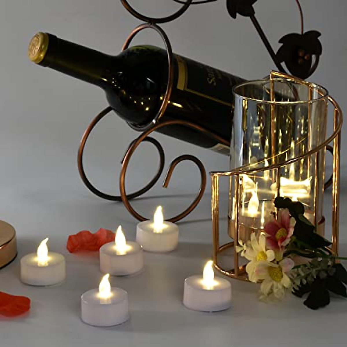 Artmarry Battery Operated Tea Lights Flameless Flickering LED Tealights 24 Pack Warm White Lamp Votive Fake Candle Long Lasting 200+ Hours for Home Holiday Wedding Celebration (Warm White 24 Pack)