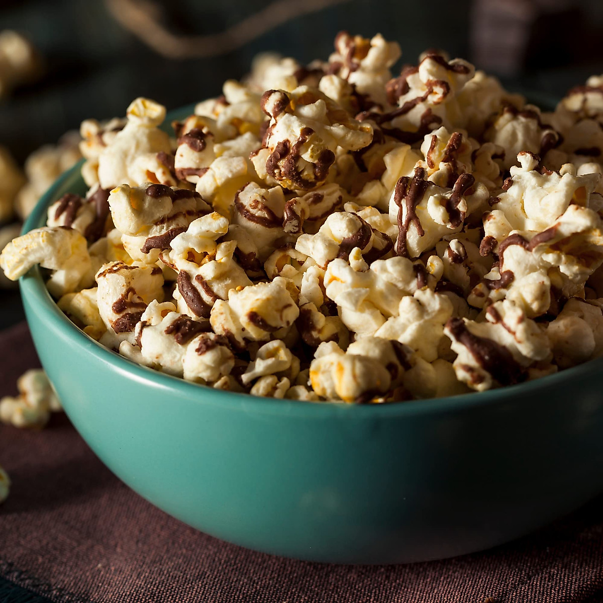 Popcorn Drizzle Sauce Bundle. Includes Two-13.1 Oz Kernel Seasons Drizzle Brittle Popcorn Topping. One Each Flavor: Caramel Drizzle and Chocolate Drizzle. Comes With a BELLATAVO Fridge Magnet!