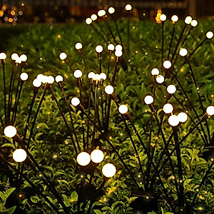 NBQQ Solar Garden Lights,Solar Firefly Lights,4 Pack 32 Heads Solar Lights Outdoor Decorative,Sway by Wind, High Flexibility Iron Wire & Heavy Bulb Base,Yard Patio Pathway Lawn Decoration