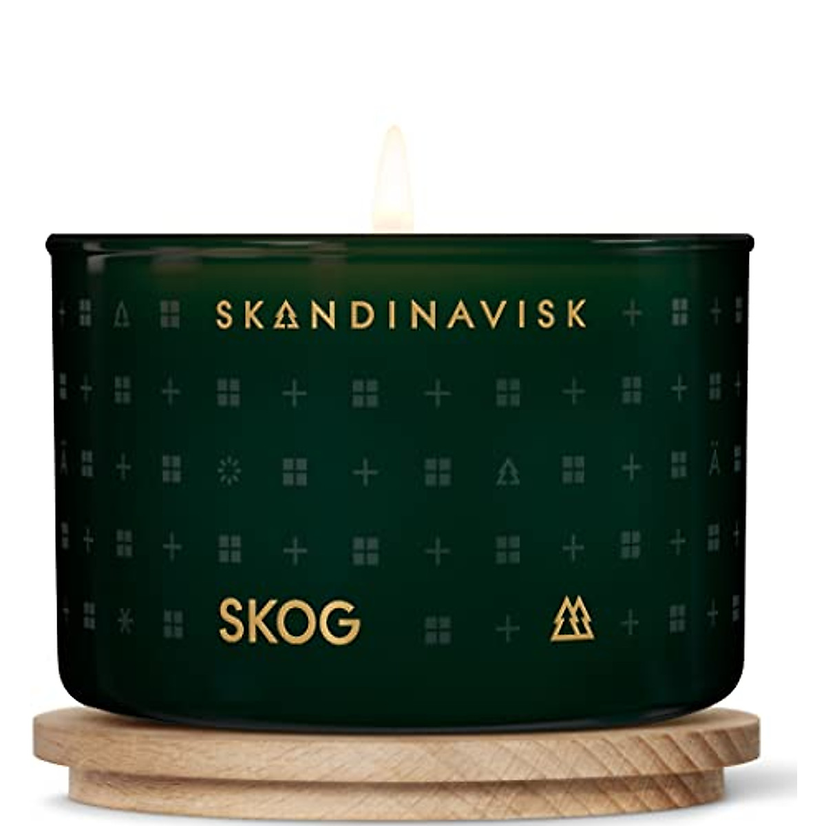 Skandinavisk Skog 'Forest' Scented Candle. Fragrance Notes: Pine Needles and Fir Cones, Birch Sap and Lily of The Valley. 3.17 oz.