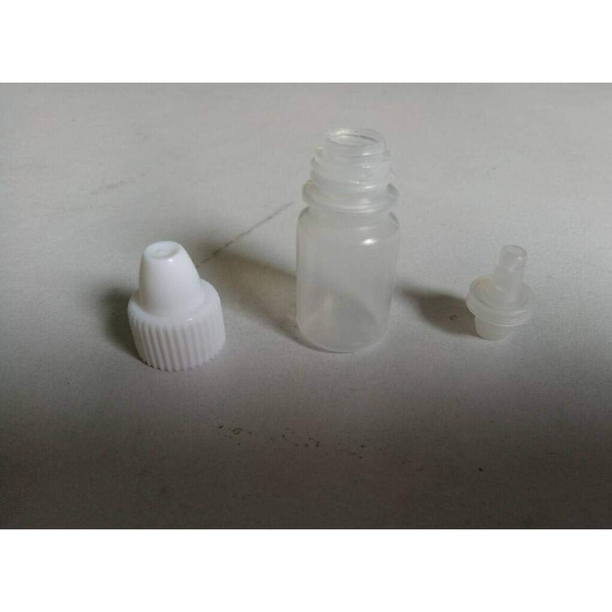 50 Pcs Empty Plastic Squeezable Dropper Bottle with Plug Refillable Portable Eye Liquid Container with Screw Cap (2 ml) by ASTRQLE