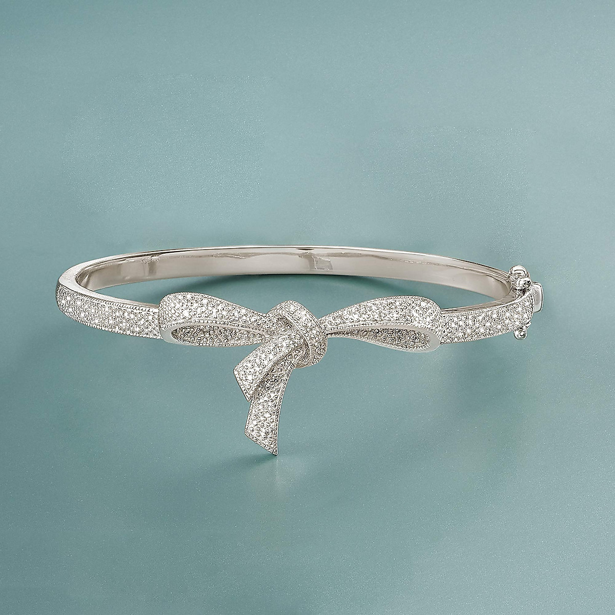 Ross-Simons 0.15 ct. t.w. Diamond Bow Bangle Bracelet in Sterling Silver. 8 inches