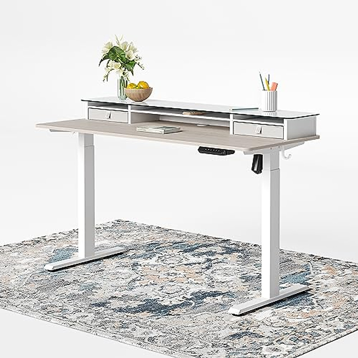 FEZIBO Electric Standing Desk with Double Drawers, 55 x 24 Inch Glass Top Monitor Stand Adjustable Sit Stand Desk with Storage Shelf, White Frame/LightWalnut Top