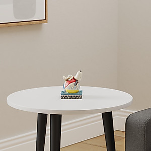 Enesco Peanuts by Jim Shore Snoopy Lounging on a Beach Ball Figurine, 4.625 Inch, Multicolor