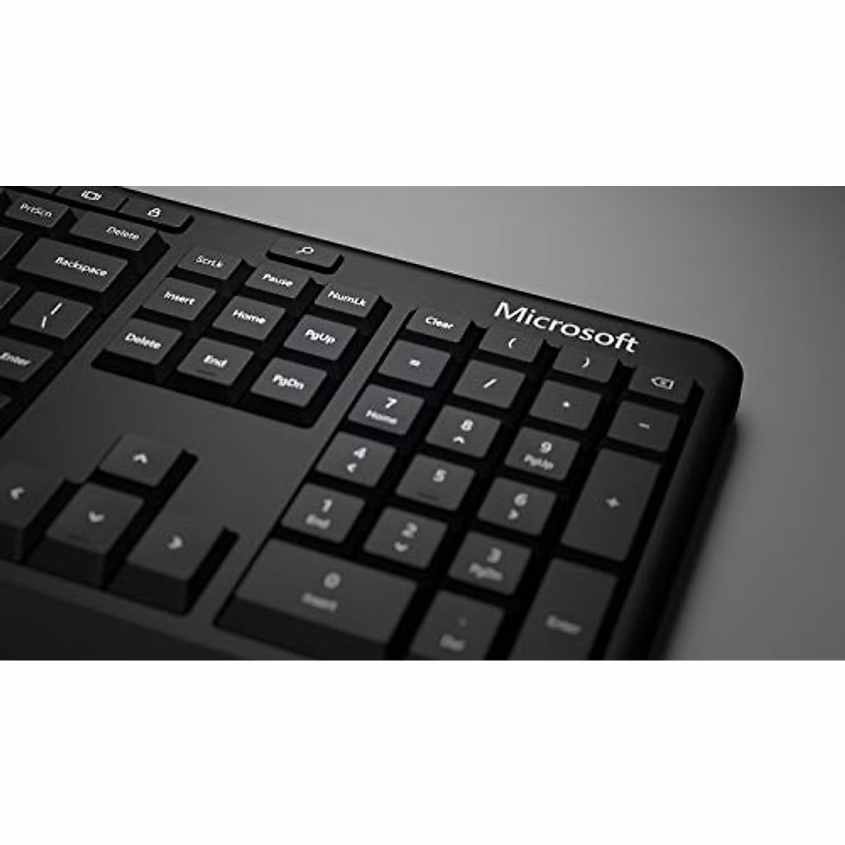 Microsoft Ergonomic Keyboard - Black. Wired, Comfortable, Ergonomic Keyboard with Cushioned Wrist and Palm Support. Split Keyboard. Dedicated Office Key.