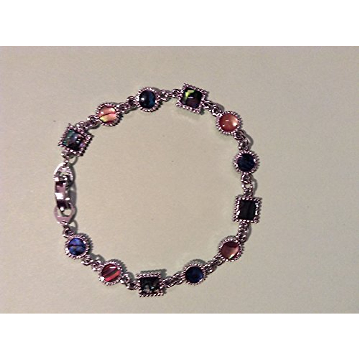 Shell of the Sea This circle & square Paua shell link bracelet is so cute & 7"