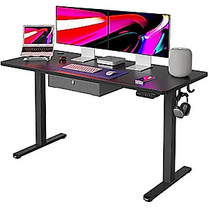 FEZIBO 55 x 24 Inches Standing Desk with Drawer, Adjustable Height Electric Stand up Desk, Sit Stand Home Office Desk, Ergonomic Workstation Black Steel Frame/Black Tabletop