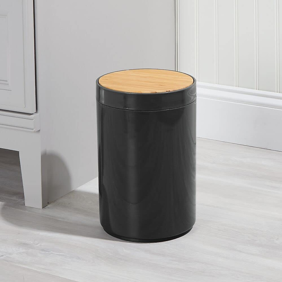 mDesign Plastic Round Trash Can Small Wastebasket - Garbage Bin Container with Swing-Close Lid - Bathroom Garbage Basket - Holds Waste, Recycling - 1.3 Gallon - Basa Collection - Black/Natural