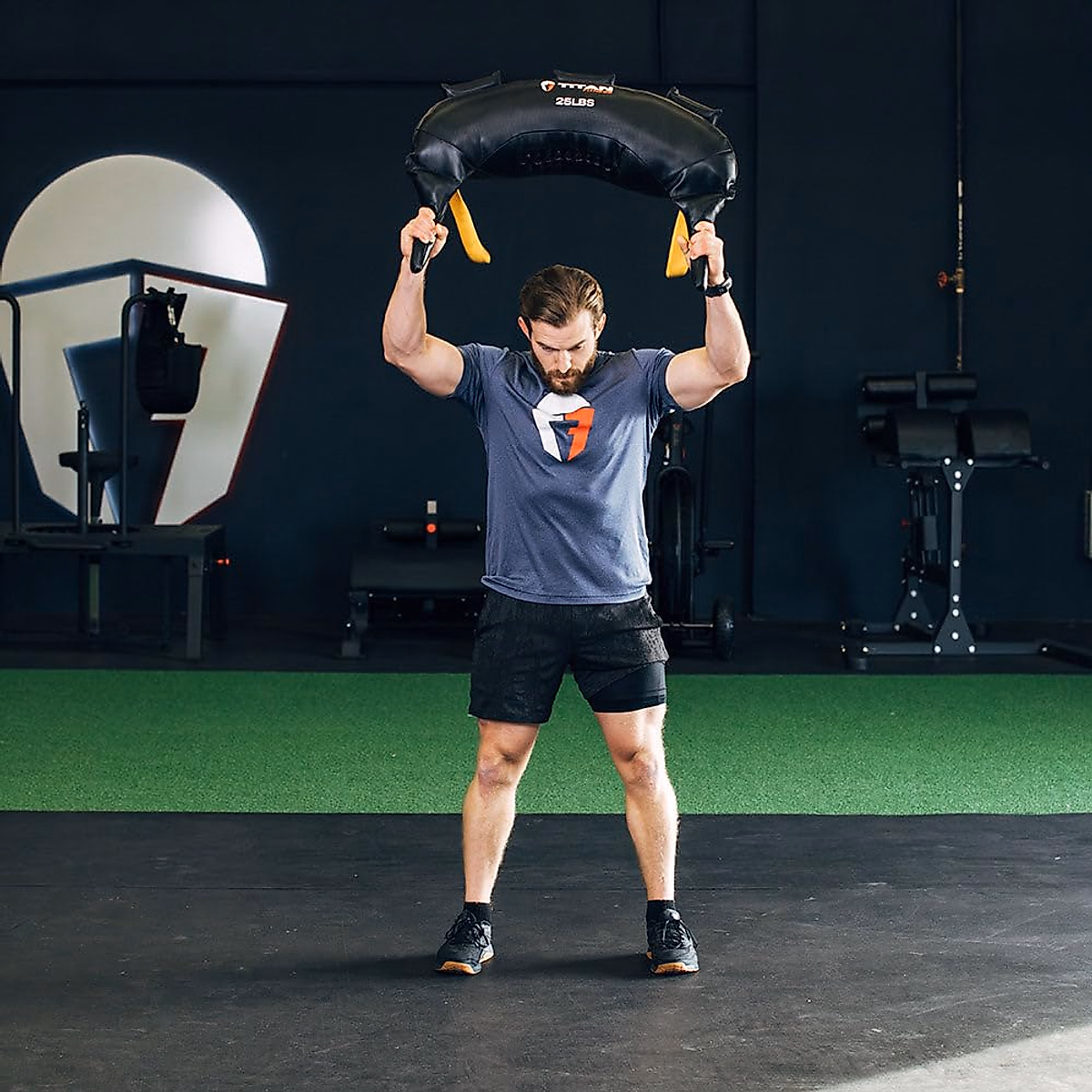 Titan Fitness 20 LB Functional Training Swing Bag, PU Material Bulgarian Power Sand Bag, Multiple Grips for Squats, Lunges, Throws, and More