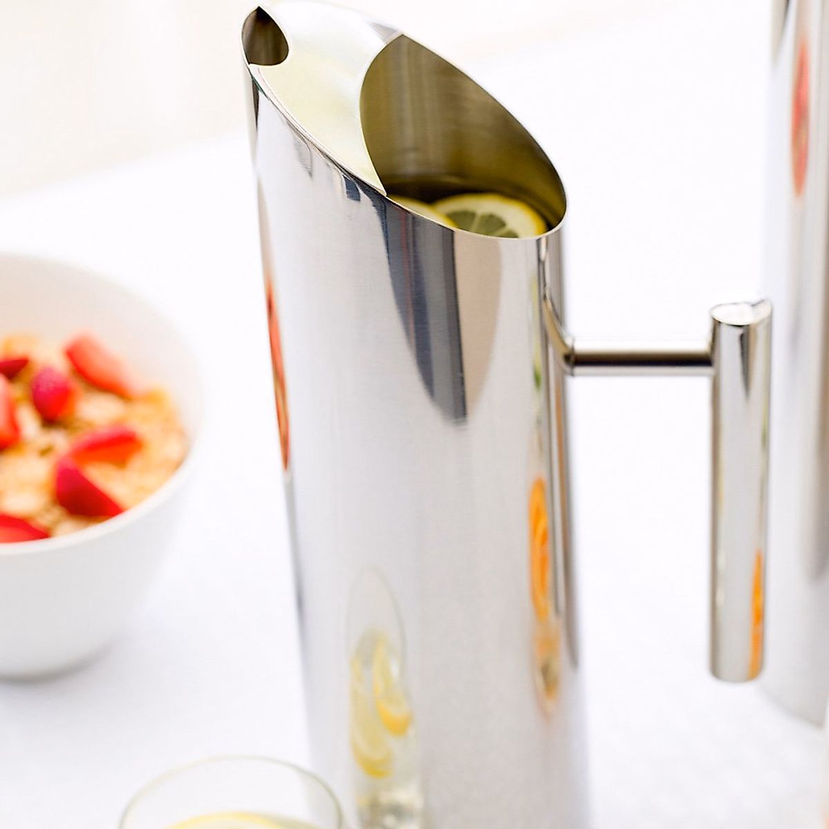 Restaurantware Met Lux 50 Ounce Modern Water Pitcher, 1 Dent-Resistant Metal Drink Pitcher - With Ice Guard, Built-In Handle, Polished Stainless Steel Water Serving Pitcher, For Water Or Iced Tea