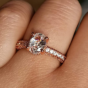 XIALV Rose Gold Plated Cubic Zirconia 2 Carats Oval Cut Ring Simulated Diamond CZ Wedding Engagement Ring for Women (US size 10)