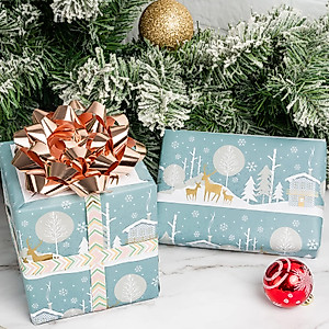 WRAPAHOLIC Reversible Christmas Wrapping Paper - 30 Inch X 100 Feet Jumbo Roll Blue and White Reindeer Family Holiday Landscape and Stripe Design