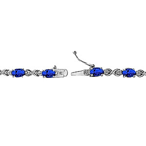 B. BRILLIANT Sterling Silver Created Blue Sapphire 6x4mm Oval Infinity Bracelet with White Topaz Accents