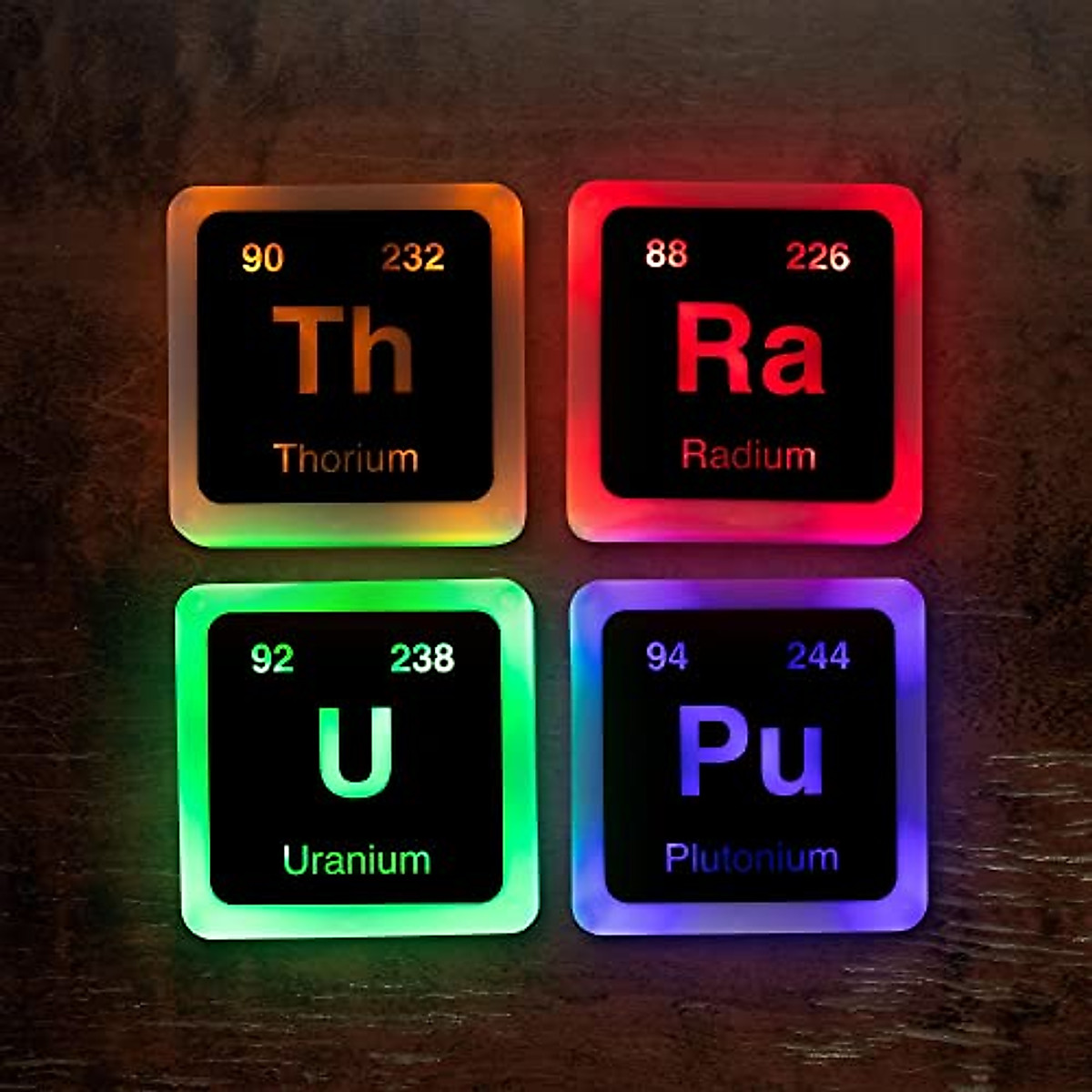 ThinkGeek Radioactive Elements Glowing Coaster Set - Radium, Plutonium, Uranium, and Thorium - Set of 4