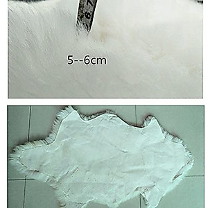 Genuine Ivory Sheepskin Rug Natural Single Short Lamb Fur Rug Soft Sheepskin Irregular Area Rug Fluffy Rugs Carpet for Bedroom,Home,Sofa 2.1x3.8ft