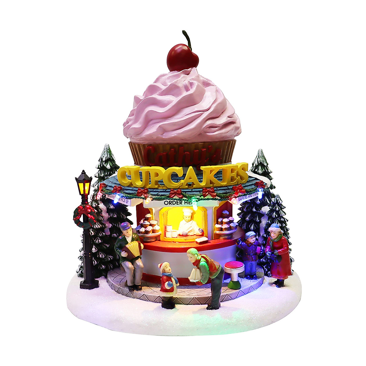 MOMENTS IN TIME Christmas Village Building, Cupcake Shop with LED Lights and Christmas Music - Battery Operated (not Included) (10.4" H x 9.5" W x 7.5" D)