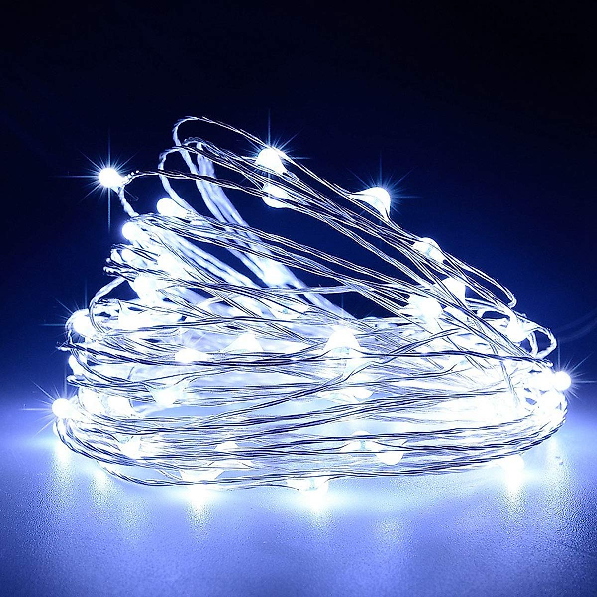 WSgift 4 Pack 33Ft 100 Cool White Led Fairy Lights Battery Operated with Remote Control Timer Waterproof Silver Copper Wire Twinkle Lights