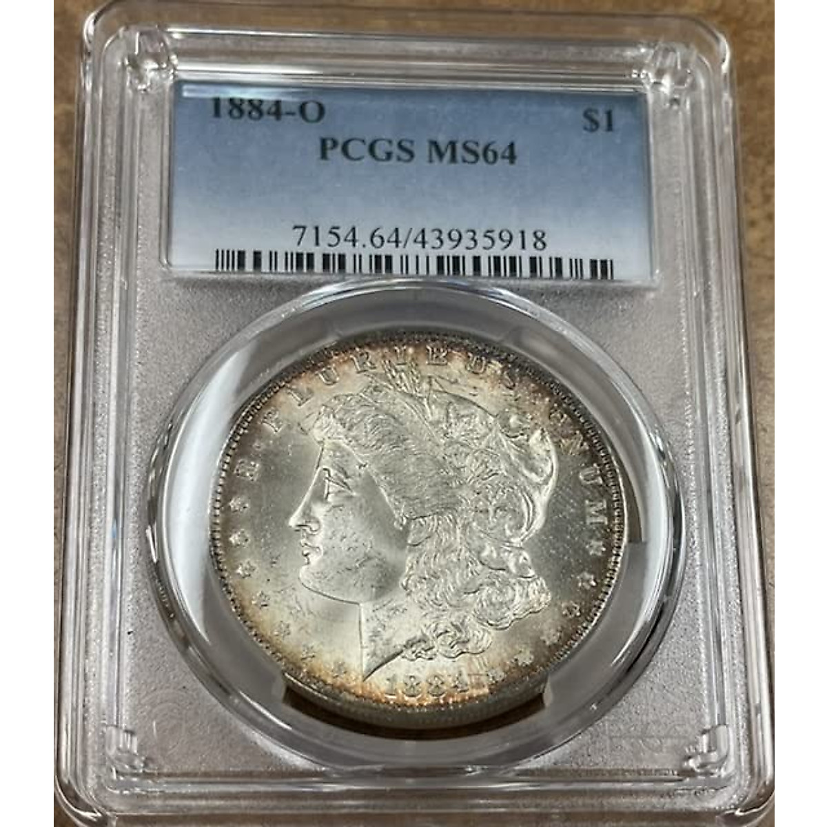 1884 O Morgan silver dollar, bright, reddish bronze rim toning $1 PCGS MS-64