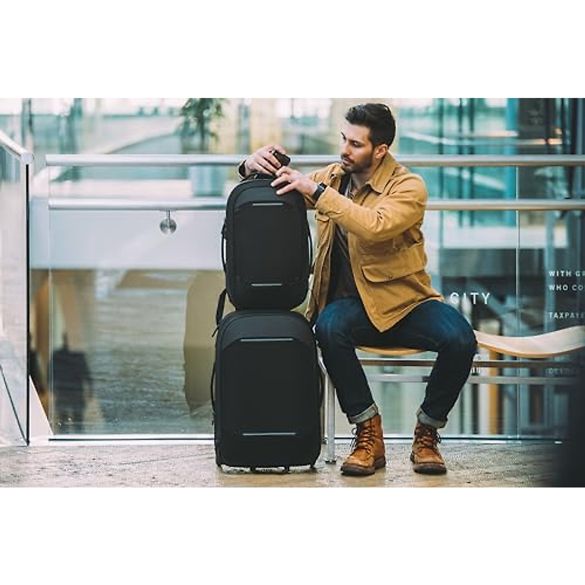 NOMATIC Navigator Carry-On 37L w/ 8L Built-In Expansion - Anti-Theft Carry-On for Airplane Travel - Premium Hardshell Roller Luggage, 17" Laptop Compartment, Black