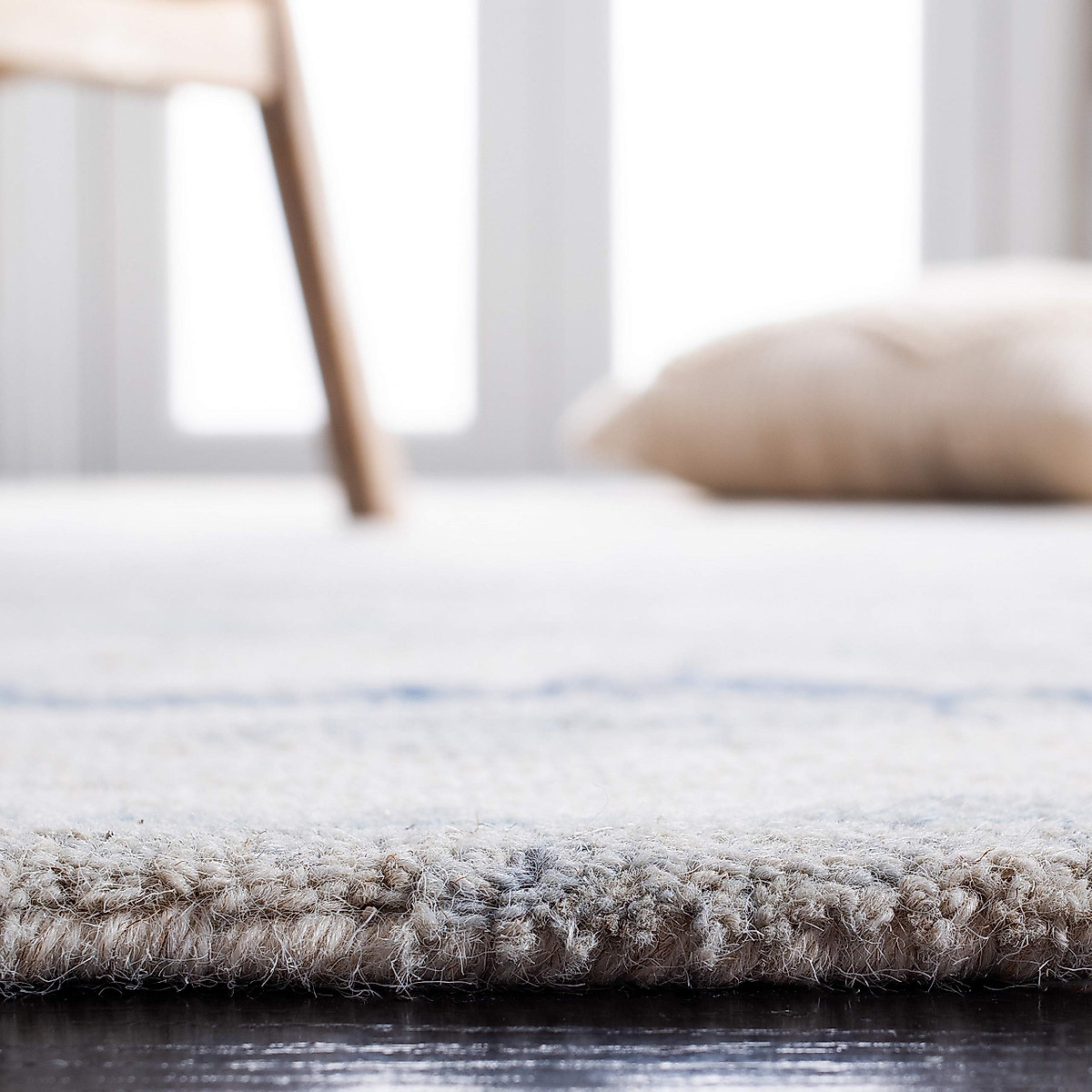 SAFAVIEH Abstract Collection Area Rug - 8' x 10', Ivory & Blue, Handmade Abstract Wool, Ideal for High Traffic Areas in Living Room, Bedroom (ABT465A)