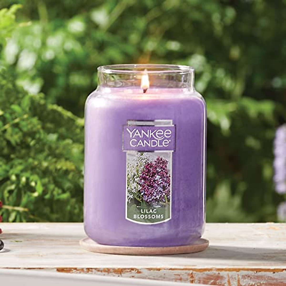 Yankee Candle Company Lilac Blossoms Scented, 22oz Single Wick Candle, Over 110 Hours of Burn Time, Perfect for Gifting, Gatherings and Seasonal Decorations, Classic Large Jar, Violet