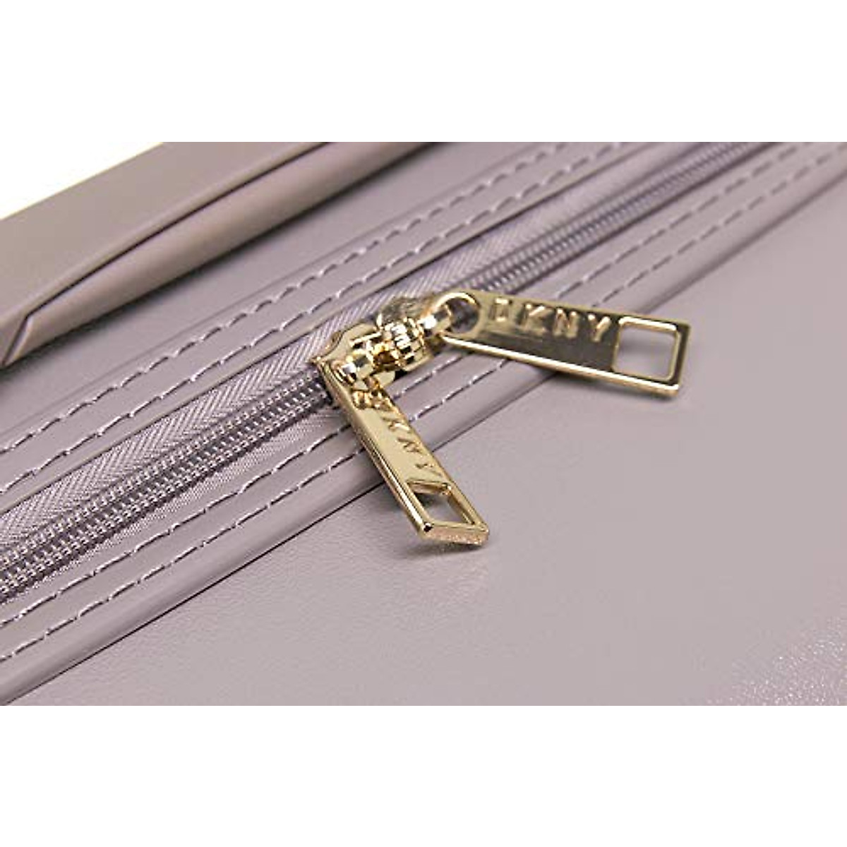 DKNY 25" Upright with 8 Spinner Wheels, Clay