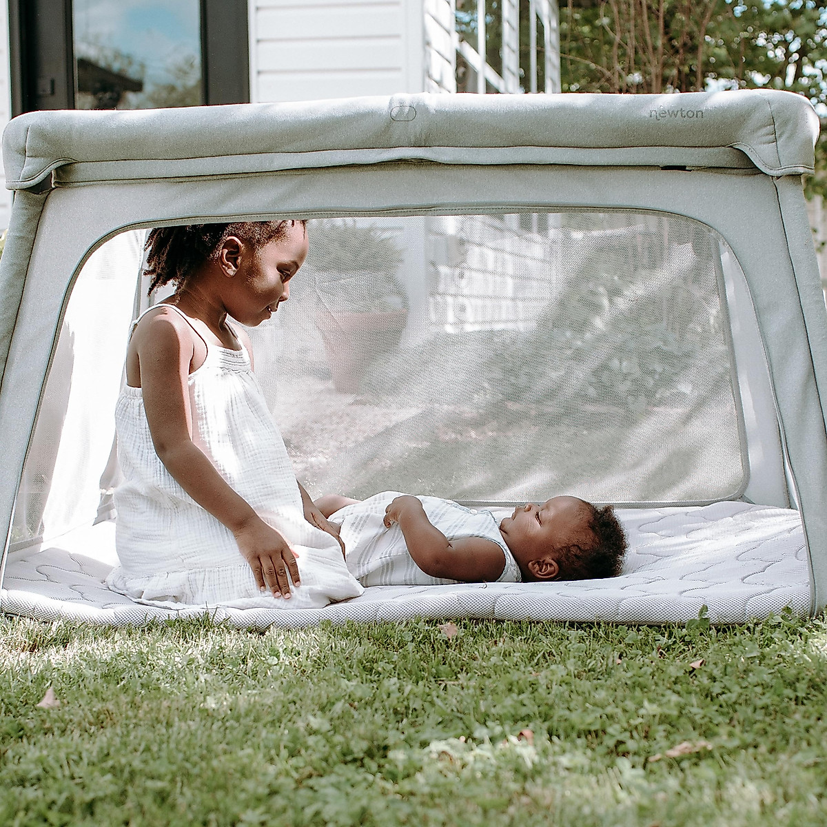 Newton Baby Travel Crib and Play Yard - 2023 Model | 100% Breathable & Washable Portable Playpen | Largest-in-Class with Travel Bag & Sheet + Optional Bassinet