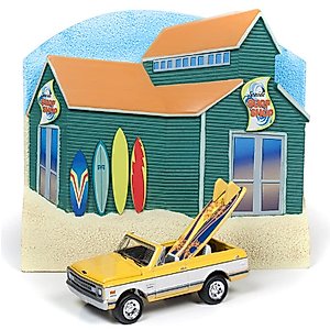 1970 Chevy Blazer Convertible Pickup Truck Yellow and White with Surf Boards and Surf Shop Front Facade Diorama Set American Snapshots 1/64 Diecast Model Car by Johnny Lightning JLDR005-BLAZER