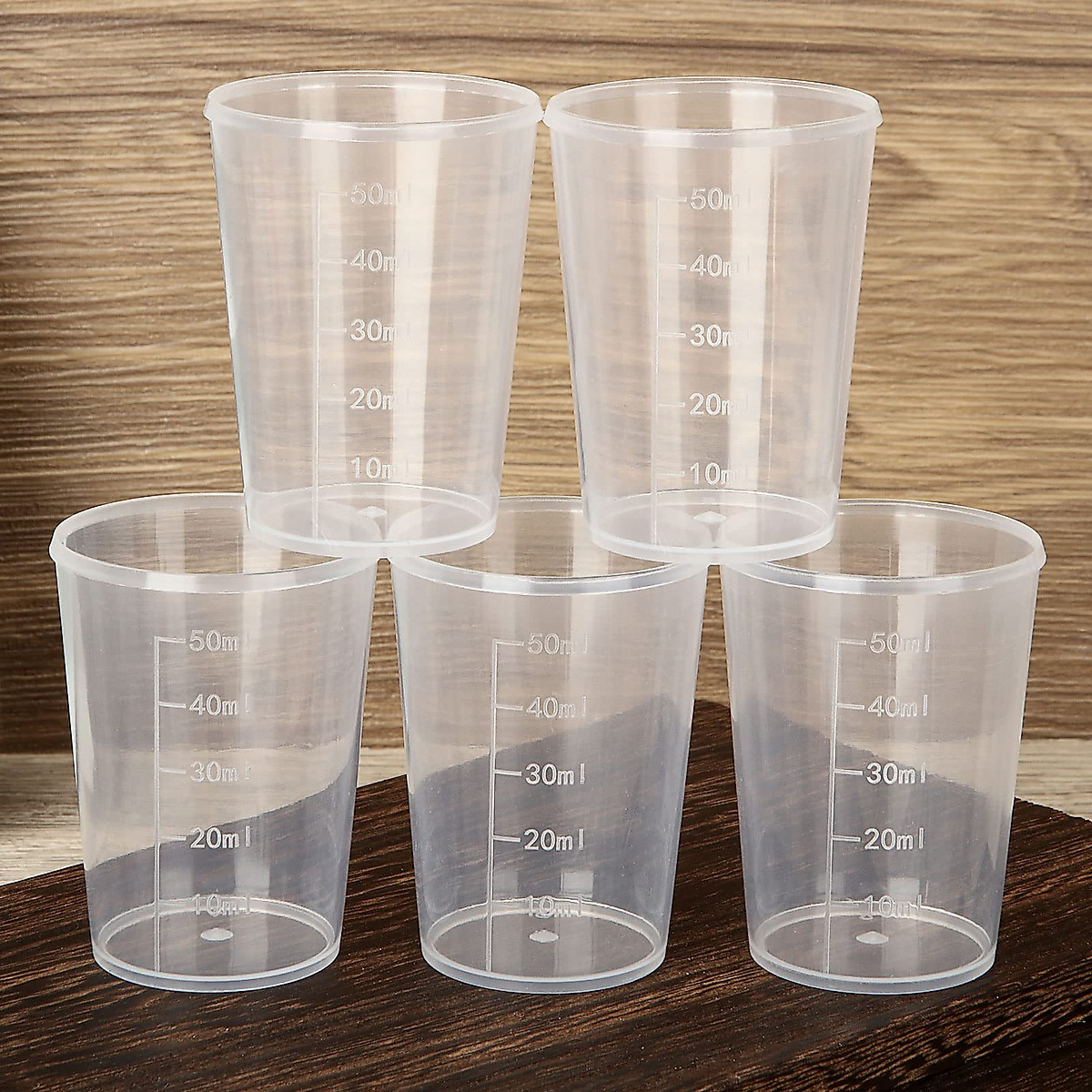 DAJAVE 100Pcs 50ML Plastic Graduated Measuring Beaker Set, Clear Resin Mixing Cups, Liquid Container Beakers for Lab Use, Graduations Liquid Container Beakers, Tapered Spout
