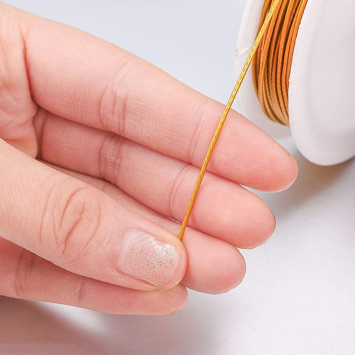 1 Roll/lot 0.3-1.0mm Bead Stringing Wire,Anti-bite Wear Resistant Strong Line Stainless Steel Tiger Tail Beading Wire for DIY Jewelry Making Finding (Gold Steel Wire, 0.6mm-92 feet/28m)