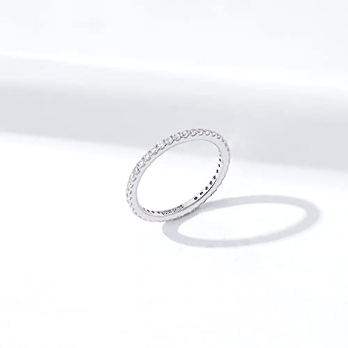 Amazon Essentials Platinum-Plated Sterling Silver Infinite Elements Cubic Zirconia Clear Round Cut Eternity Band Ring, Size 7, (previously Amazon Collection)