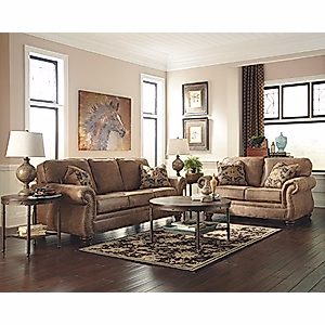 Signature Design by Ashley Larkinhurst Faux Leather Sofa with Nailhead Trim and 2 Accent Pillows, Brown