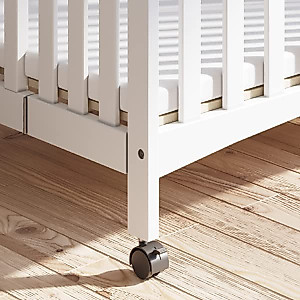 Child Craft London Mini Compact Folding Portable Crib with 2” Crib Mattress and 2 Easy Roll Locking Wheels, Durable Pine Wood Construction (Matte White)