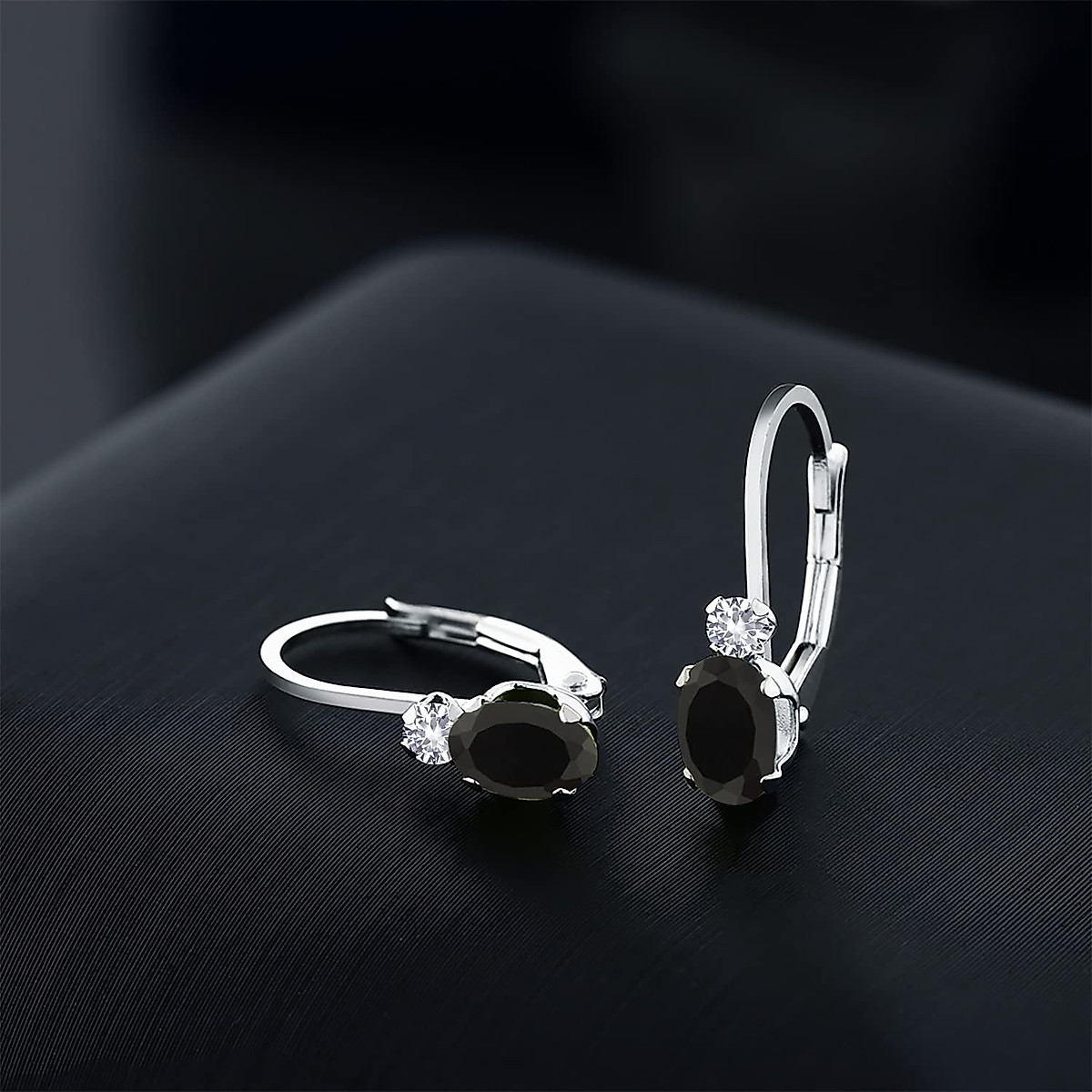 Gem Stone King 925 Sterling Silver Black Onyx and White Created Sapphire Leverback Earrings For Women (0.86 Cttw, Gemstone December Birthstone, Oval 6X4MM, Round 2MM, 3/4 Inch)