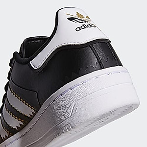 adidas Originals Women's Rich Mnisi Surperstar Ot Tech Low Shoes, Casual Leather Sneakers, Core Black/Cloud White/Gold Metallic, 9.5